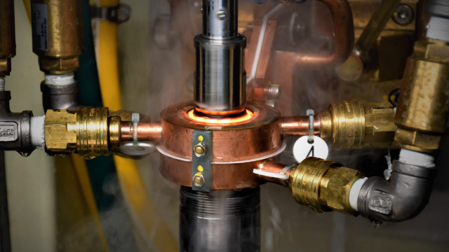 Motor Rotor Quenching & Tempering Equipment - DKK Denki Kogyo Co., Ltd.